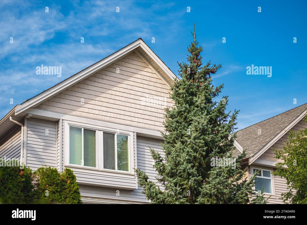 Window of a house. Top of a Mountain house on blue sky background ...