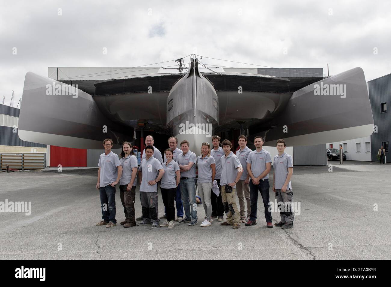 Eric Bruneel, president and founder of the shipyard and his team during ...