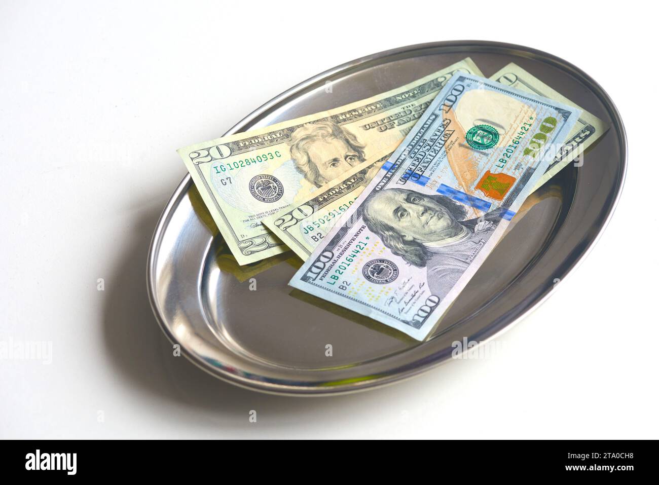 Dollar tip tray Stock Photo - Alamy