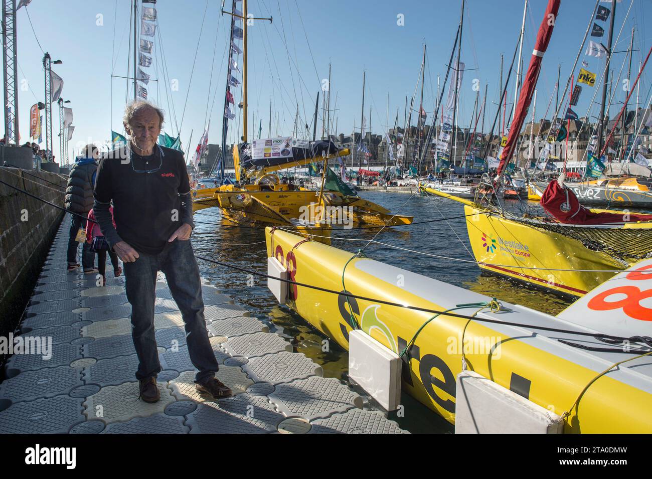 English skipper Mike Birch, first winner of the race in 1978, watching ...