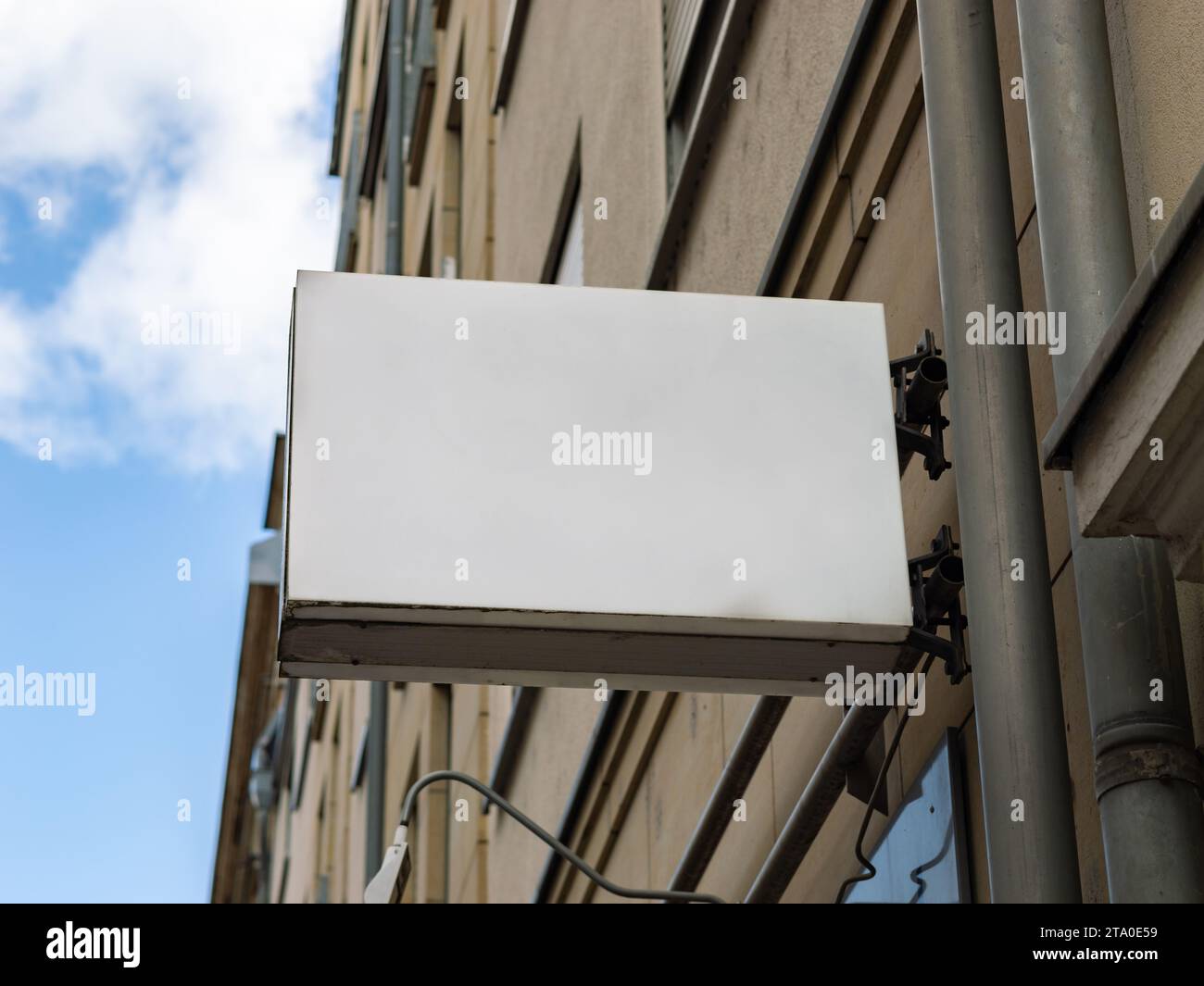 Empty sign on a facade of a business inside the building. Template for ...