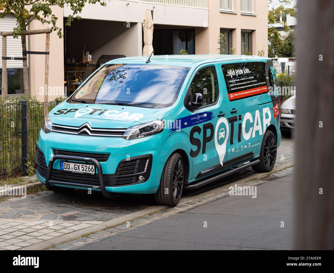 Spoticar van with the logo and company sign of the used car dealer ...