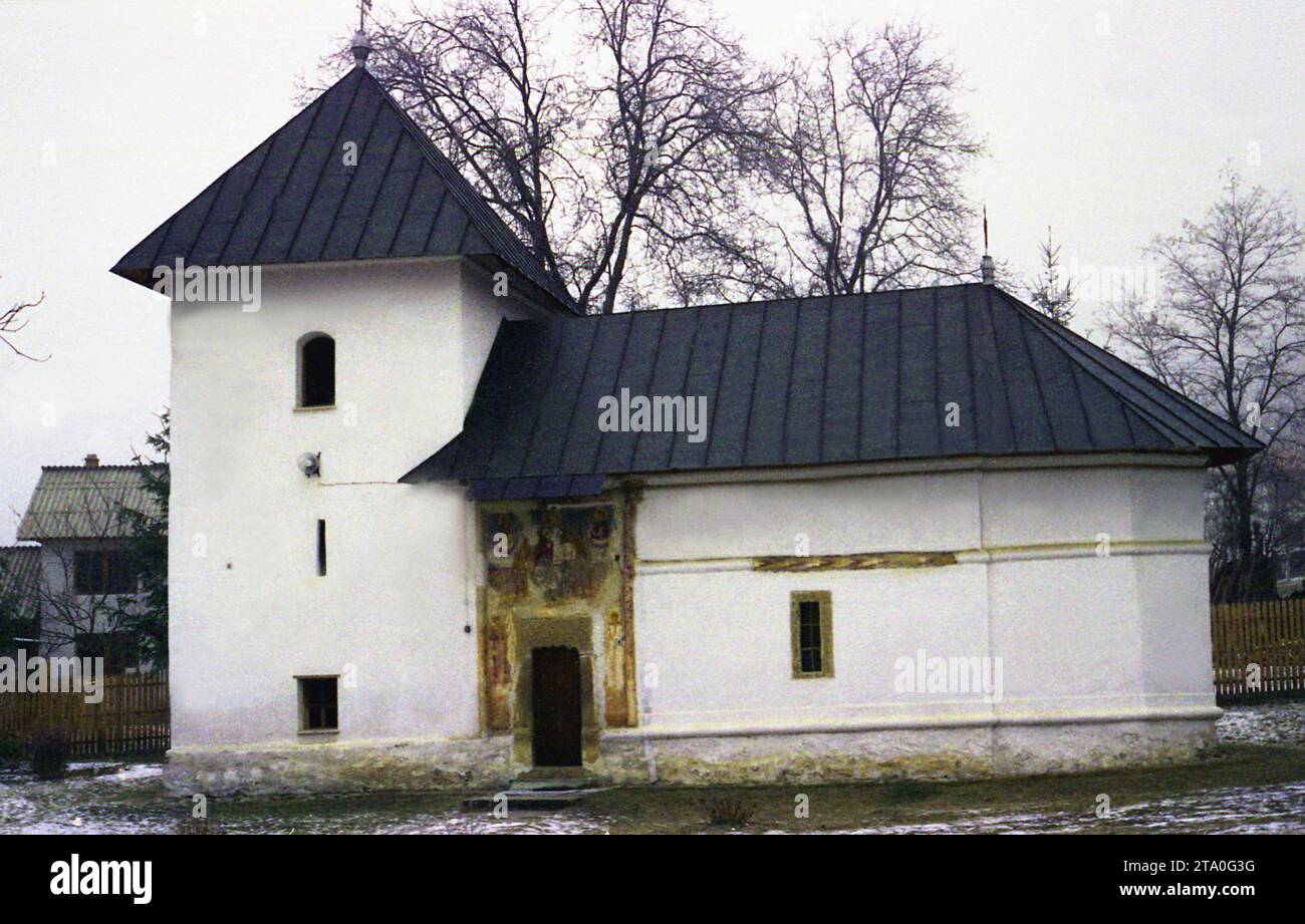 Gorj County, Romania, 2001. Exterior view of "St. Nicholas" church at ...
