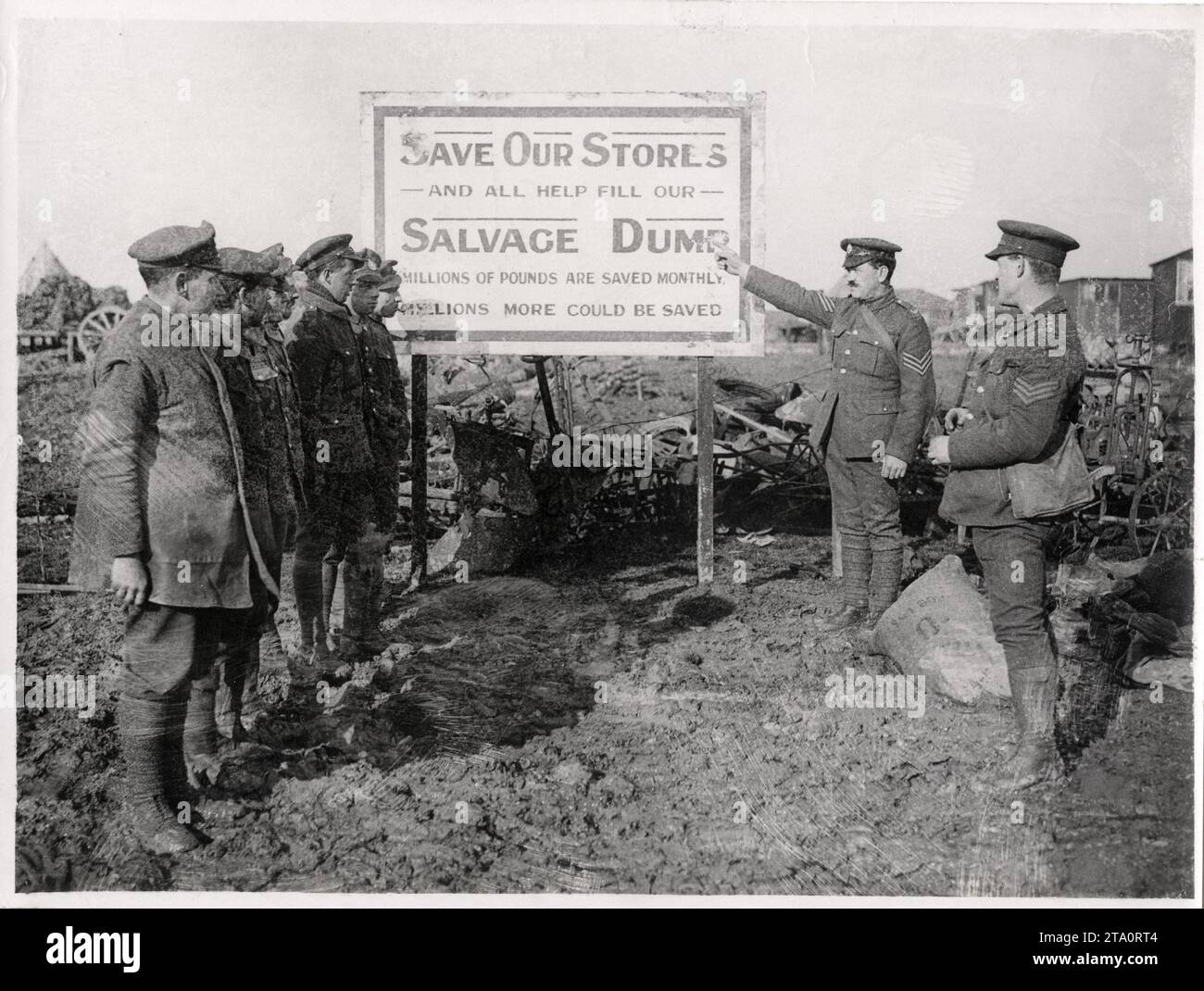 WW1 World War I - Troops reading a sign about salvaging battle waste ...