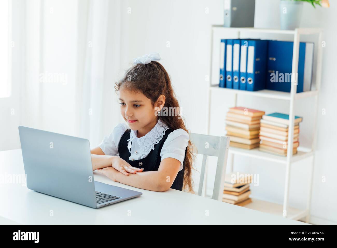Girl education in computer online at school Stock Photo - Alamy