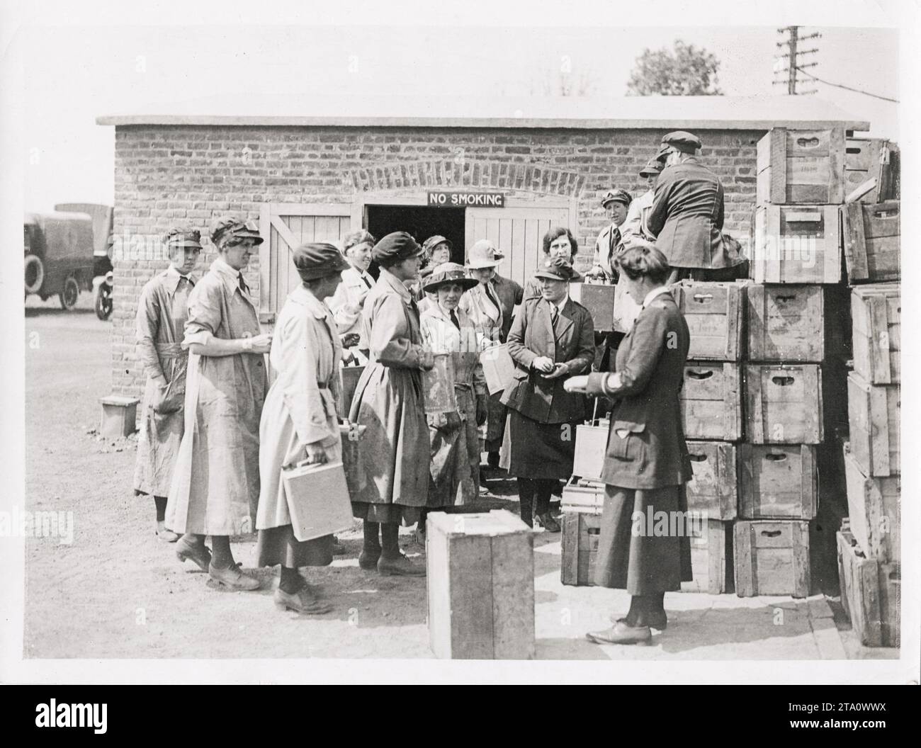 WW1 World War I - Voluntary Aid Detachment (VAD) members drawing petrol ...