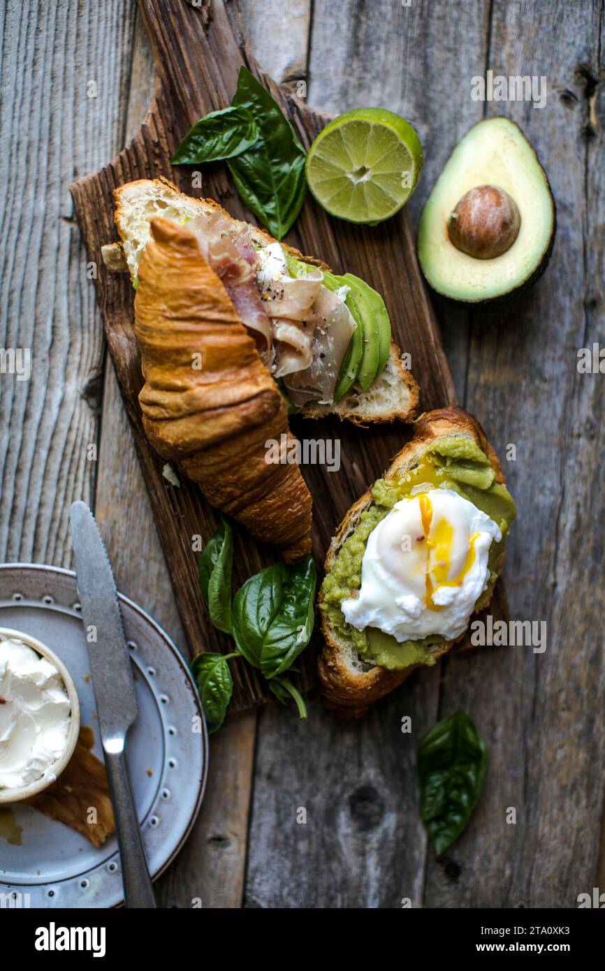Croissant sandwiches with jamon ham serrano paleta iberica, avocado ...