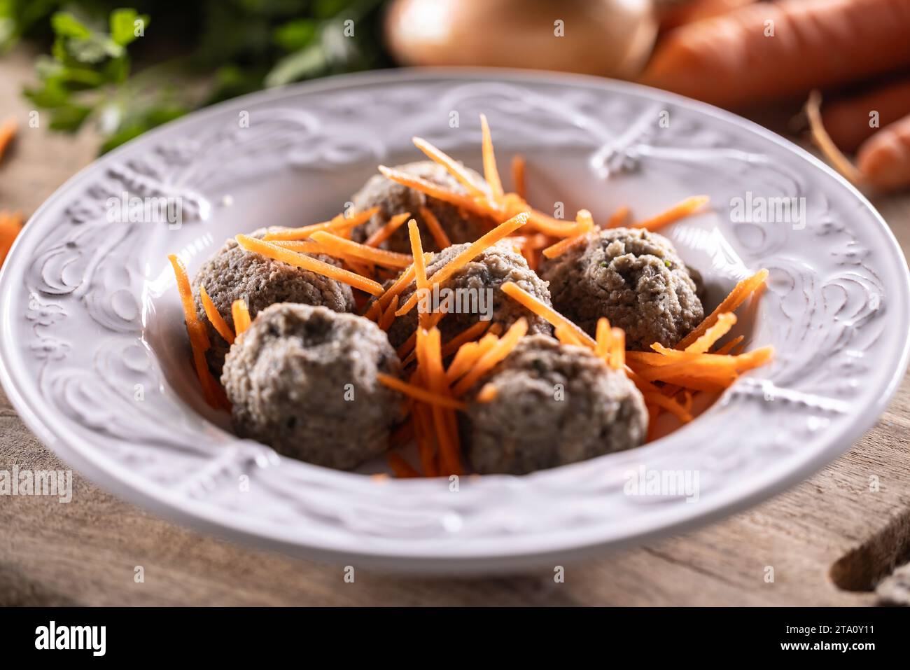 Liver dumplings made of beef liver, bread, eggs and parsley cooked in ...