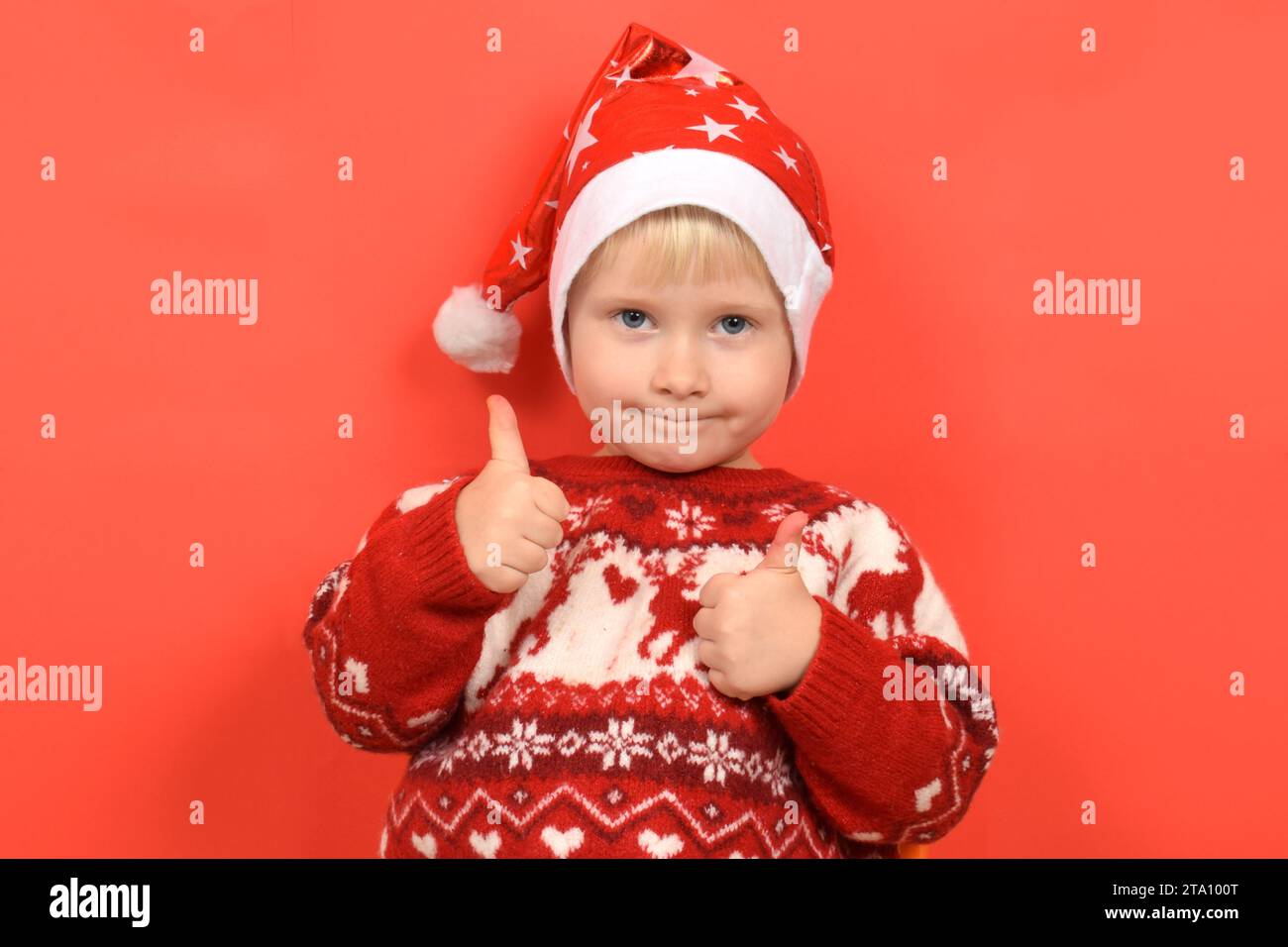 cute boy child pointing direction, Christmas Stock Photo - Alamy