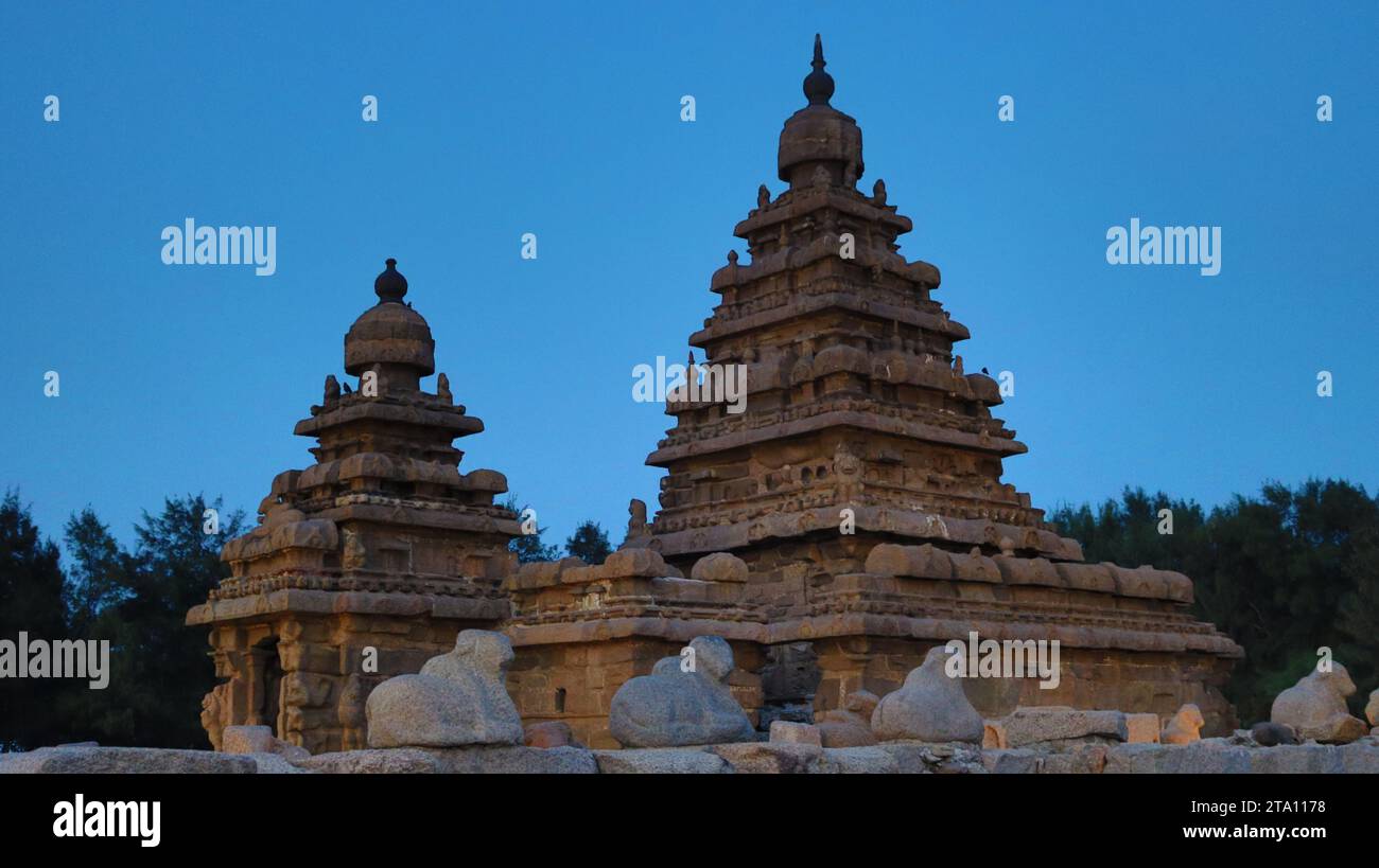 Two towers of sea shore temple in night view Stock Photo - Alamy