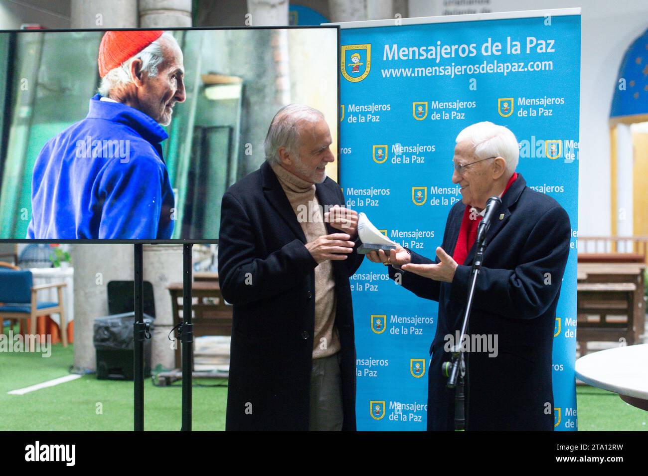 Father Ángel (right) and singer, screenwriter, film director, Paco ...