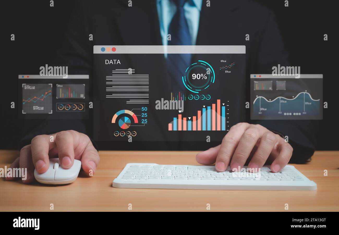 Business people use computers to analyze business and manage corporate ...