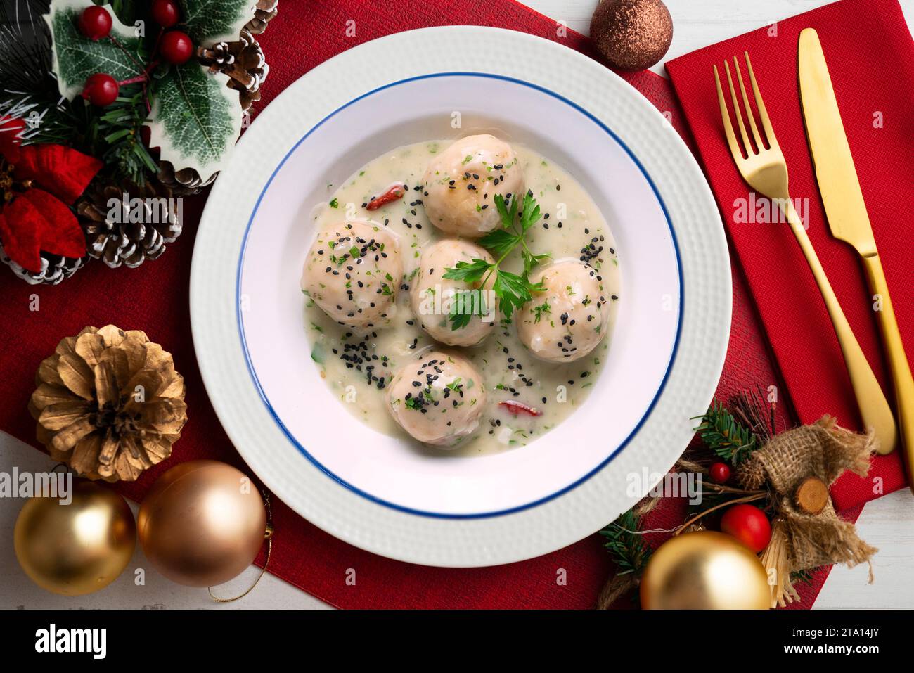 Fish meatballs with white wine sauce. Traditional tapas from Barcelona ...