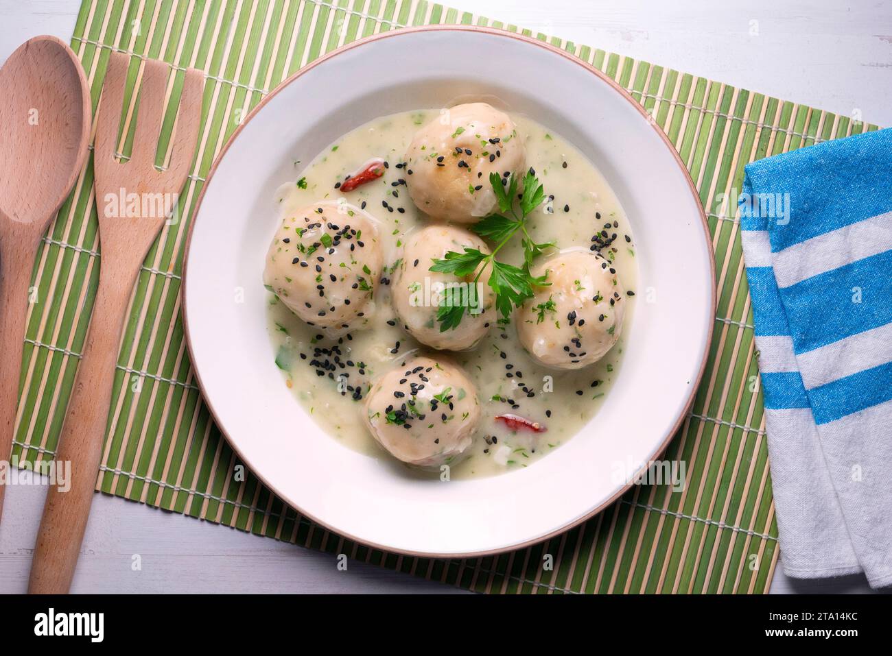 Fish meatballs with white wine sauce. Traditional tapas from Barcelona ...