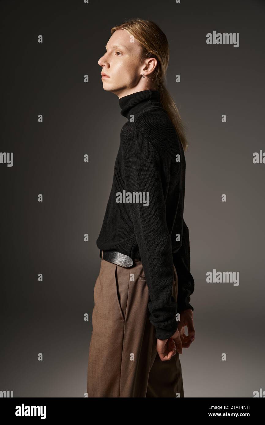 attractive non binary person in trendy black turtleneck posing in ...