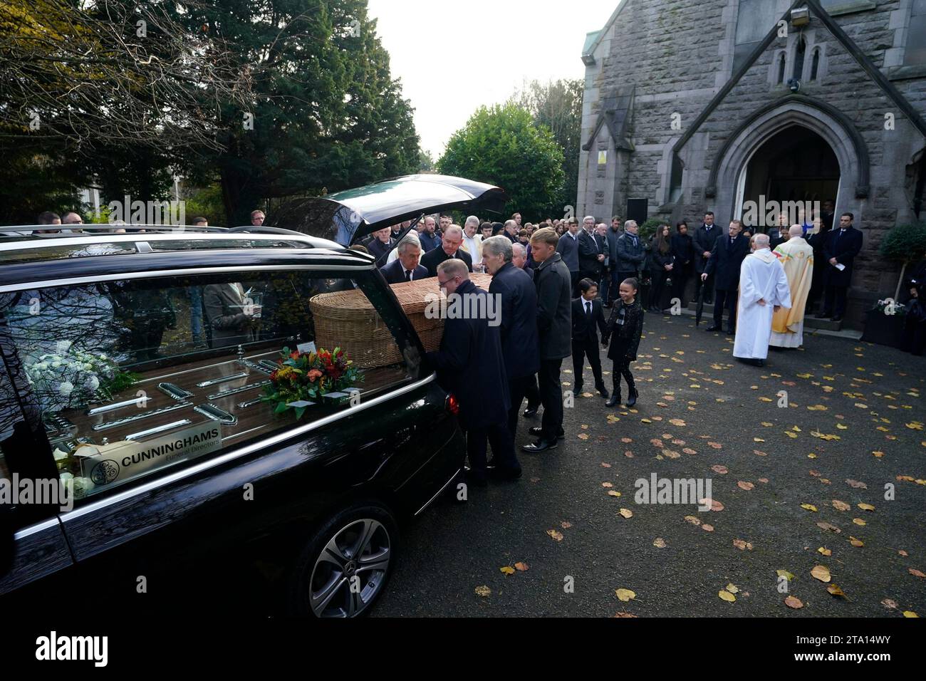 Ben Dunne's casket is placed in to the hearse at St Mochta's church in ...