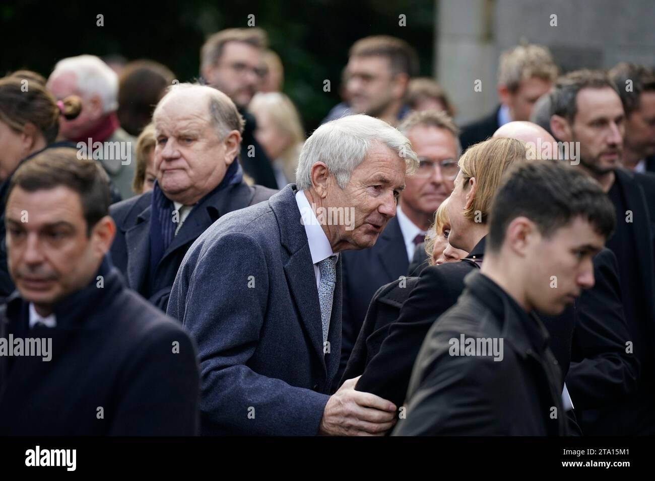 Michael Lowry TD, speaks with mourners following the funeral of Ben ...