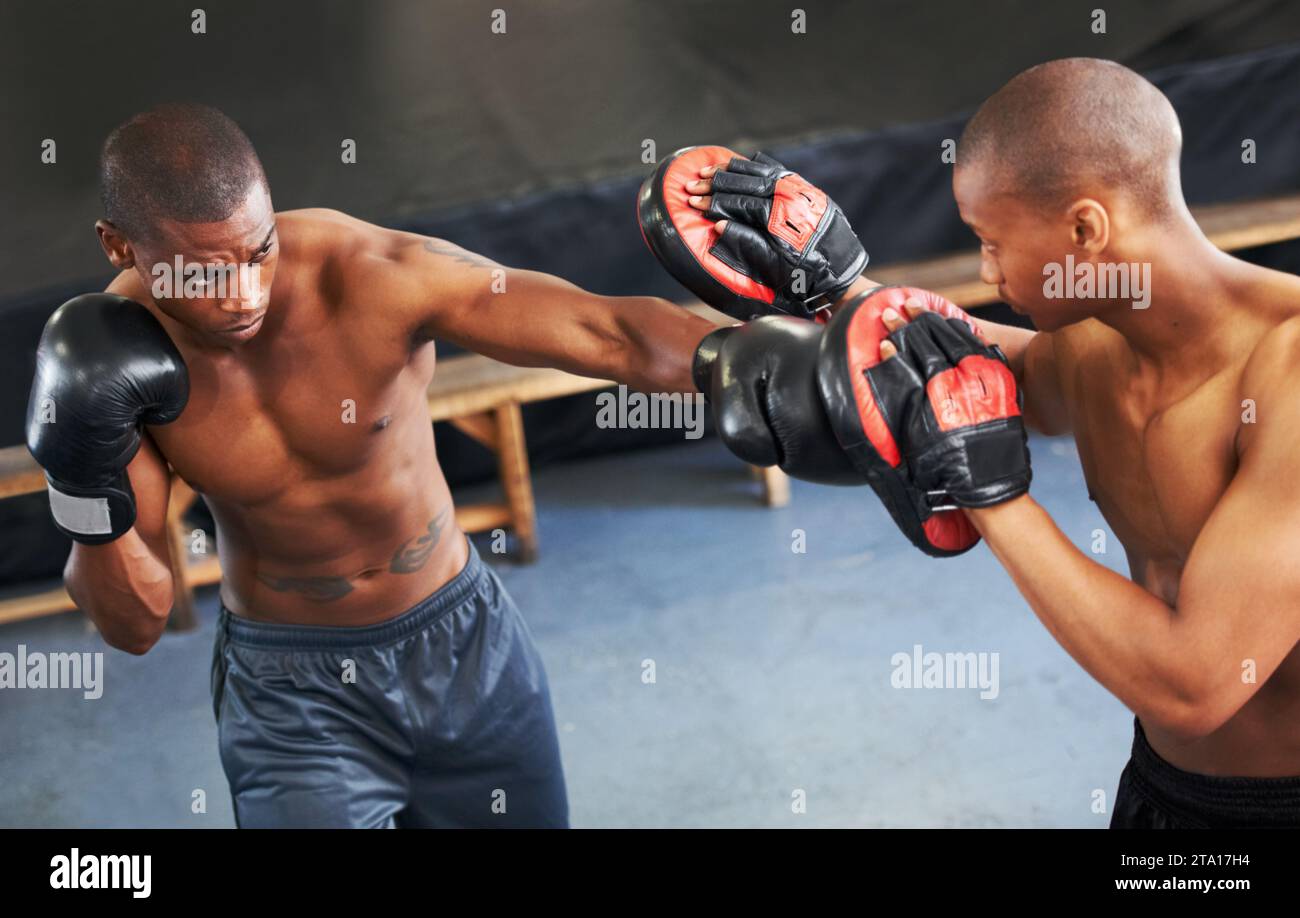 Black man exercise boxing coaching hi-res stock photography and images ...