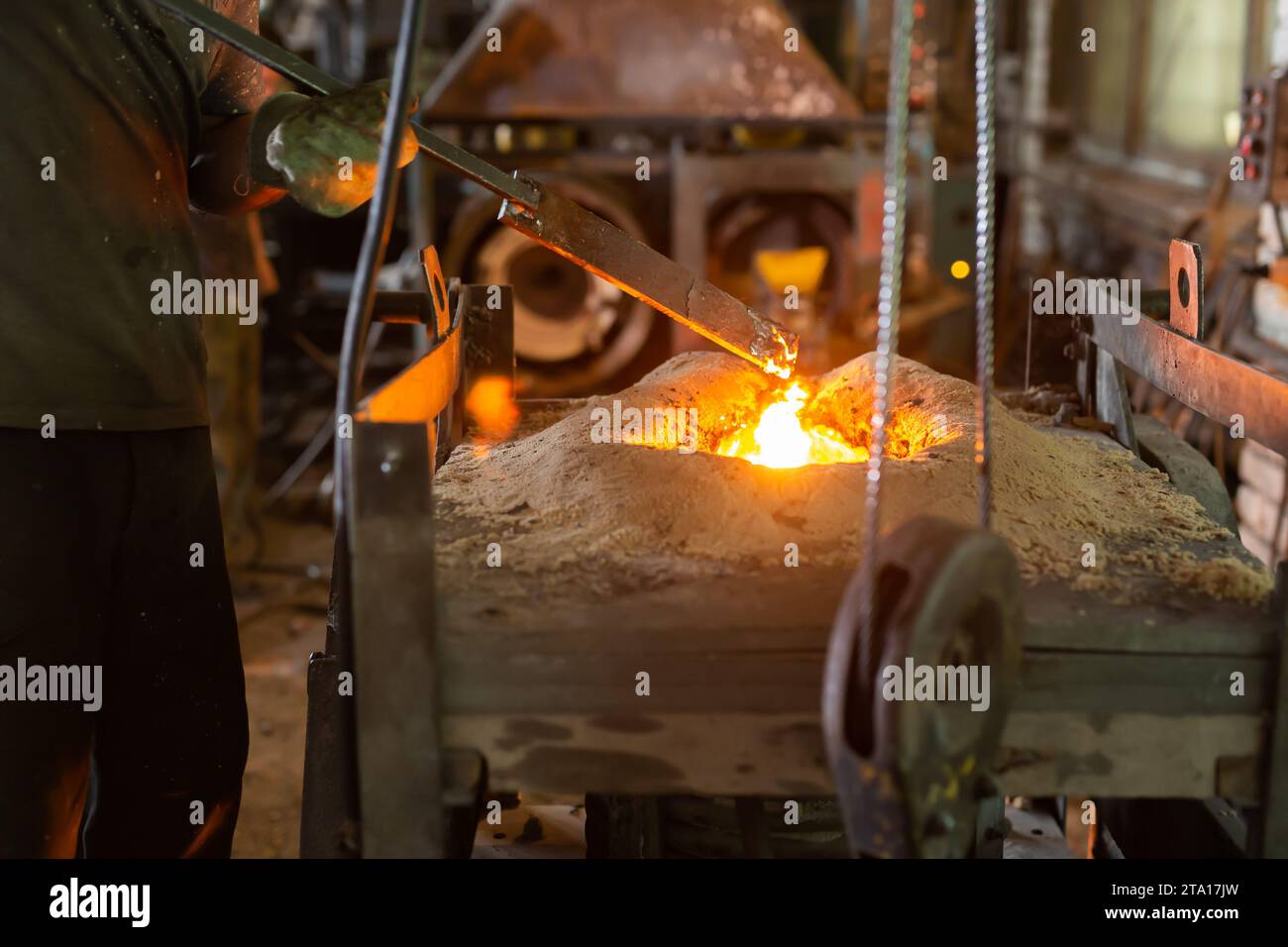 Foundry - ferrous metal is melted in an induction furnace of ...
