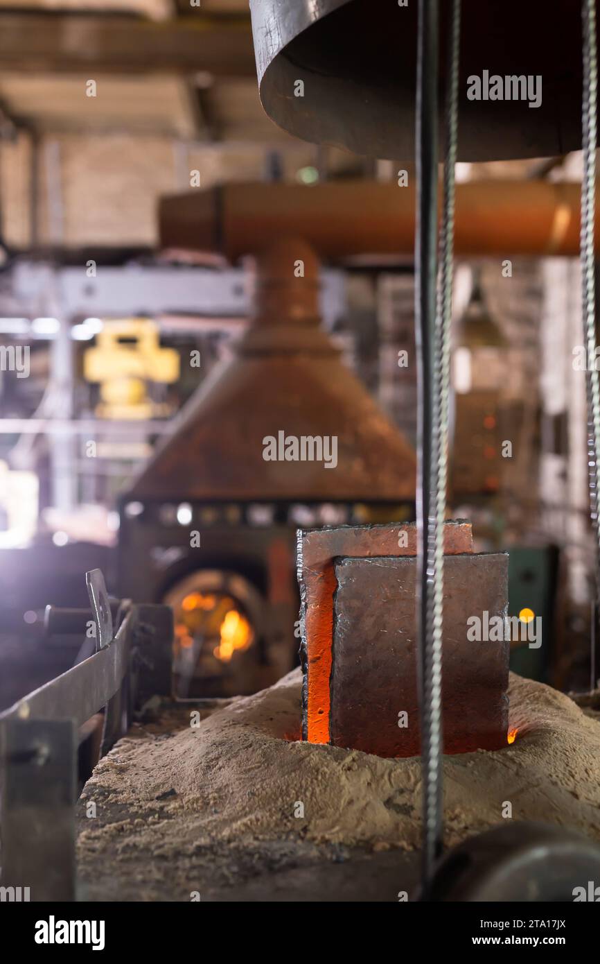 Foundry - ferrous metal is melted in an induction furnace of ...