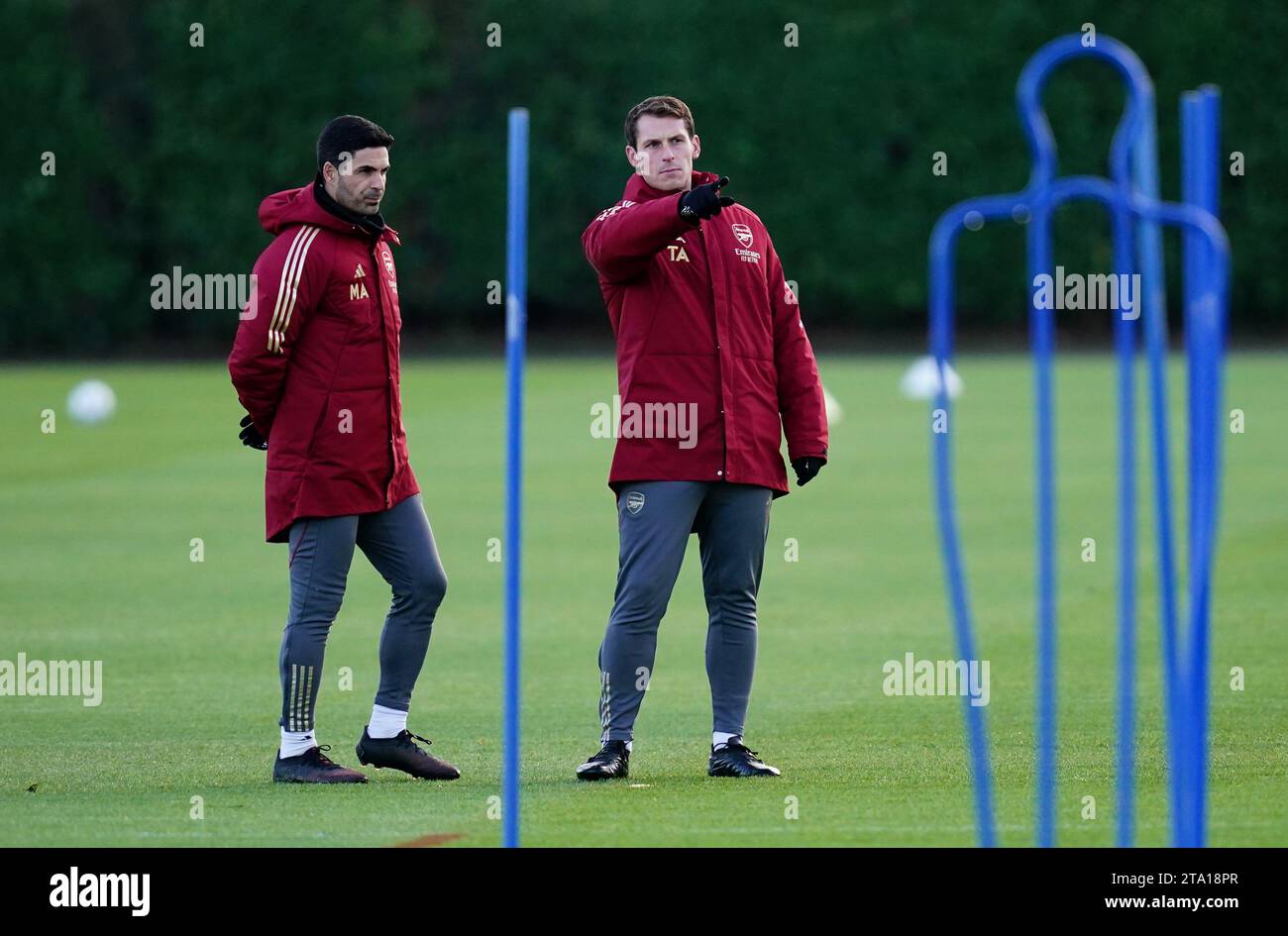 Arsenal manager Mikel Arteta (left) during a training session at the ...