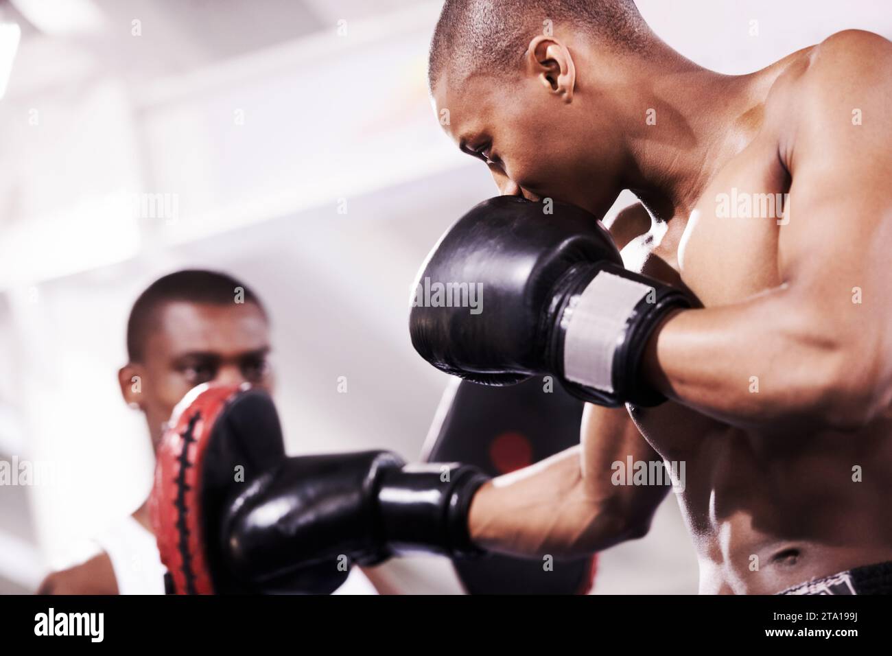 Black man, boxing and personal trainer in self defense or ring fight at ...