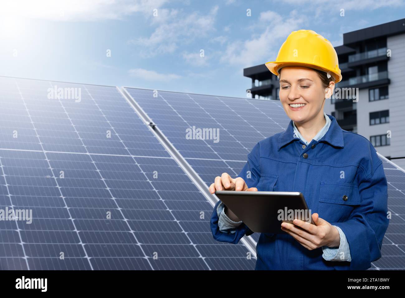 Female technician installing solar panels hi-res stock photography and ...