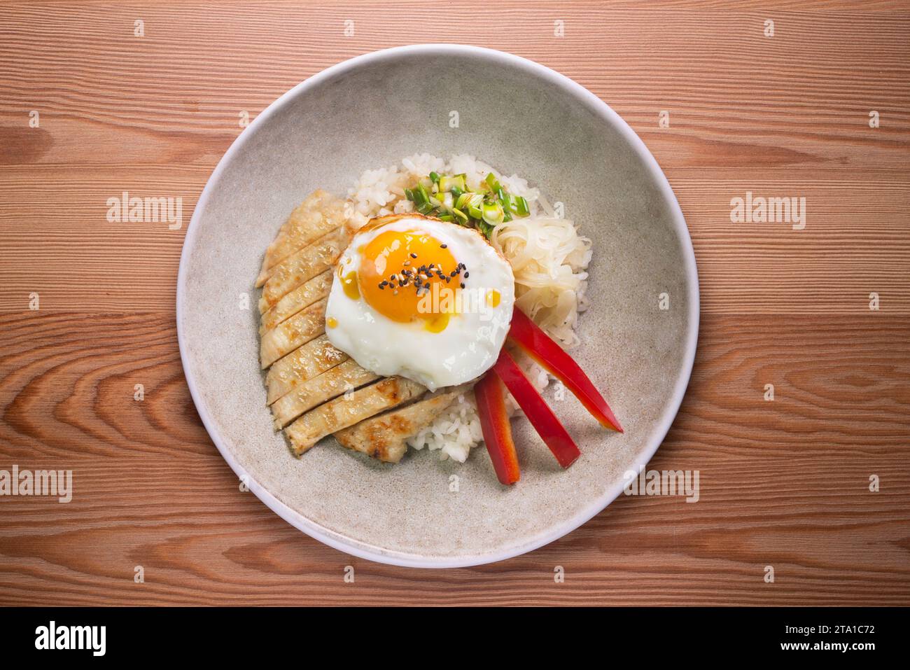 Teriyaki chicken donburi with fried egg Stock Photo - Alamy