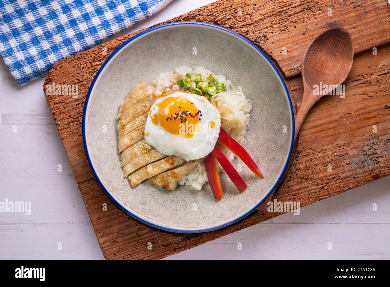 Teriyaki chicken donburi with fried egg Stock Photo - Alamy