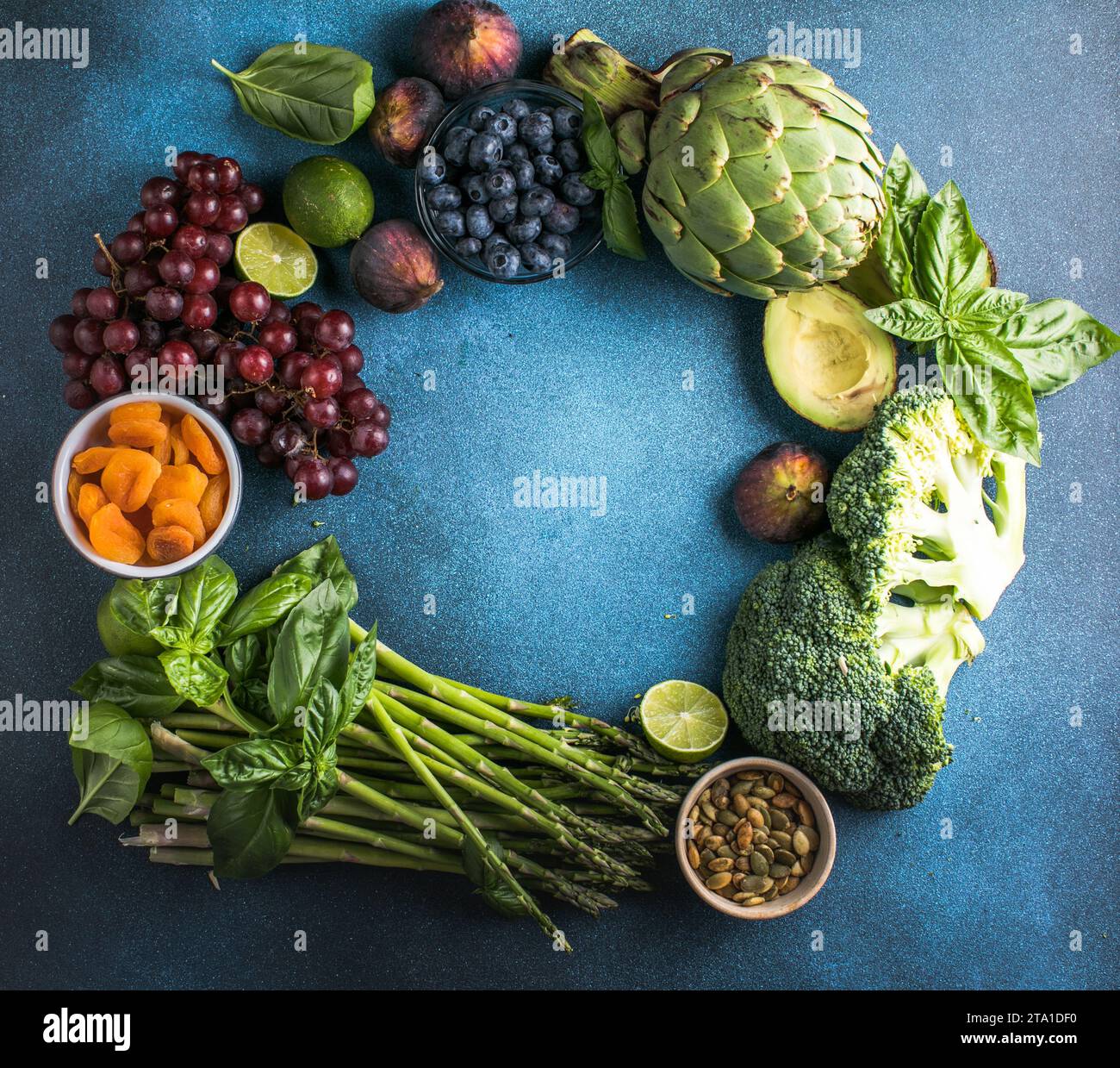Variety of fresh raw organic fruits and vegetables. Health foods high ...