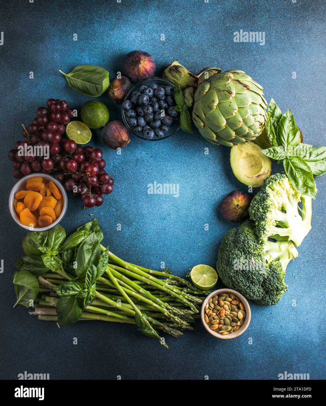 Variety of fresh raw organic fruits and vegetables. Health foods high ...