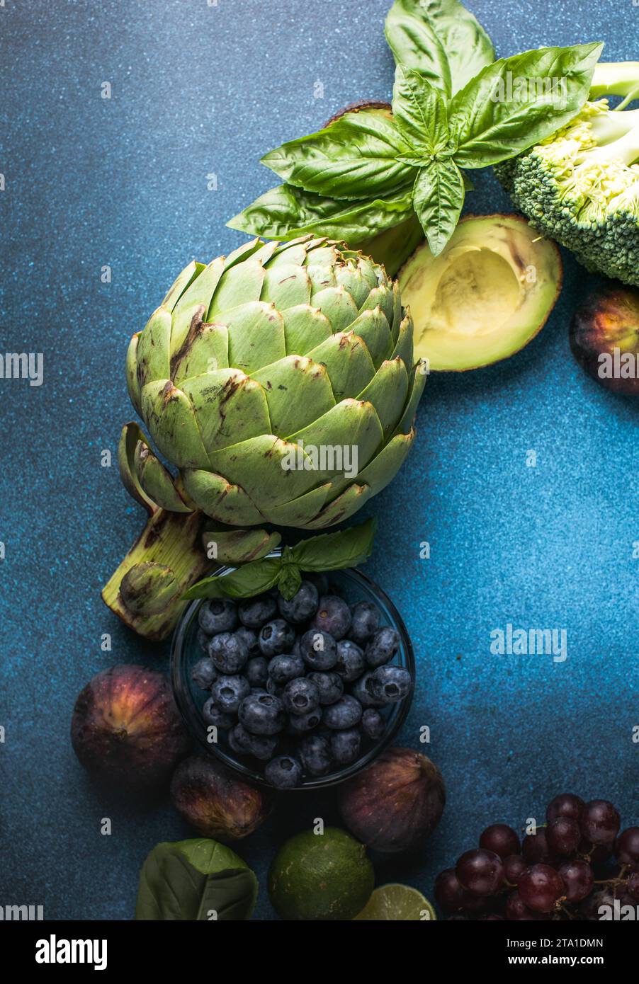 Variety of fresh raw organic fruits and vegetables. Health foods high ...