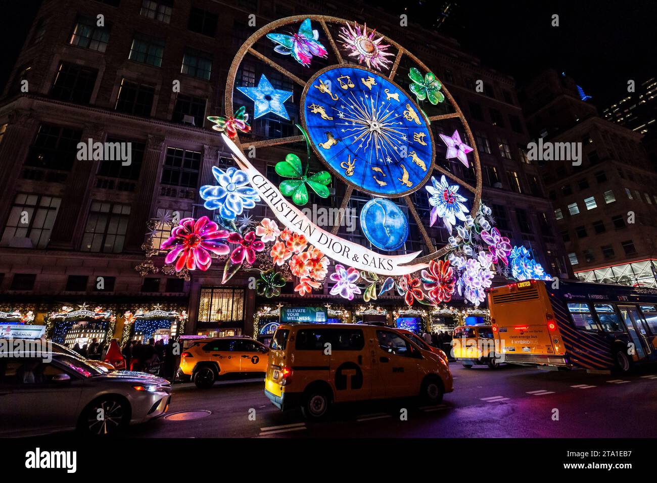 Thousands of visitors crowd Saks Fifth Avenue in New York to view their ...