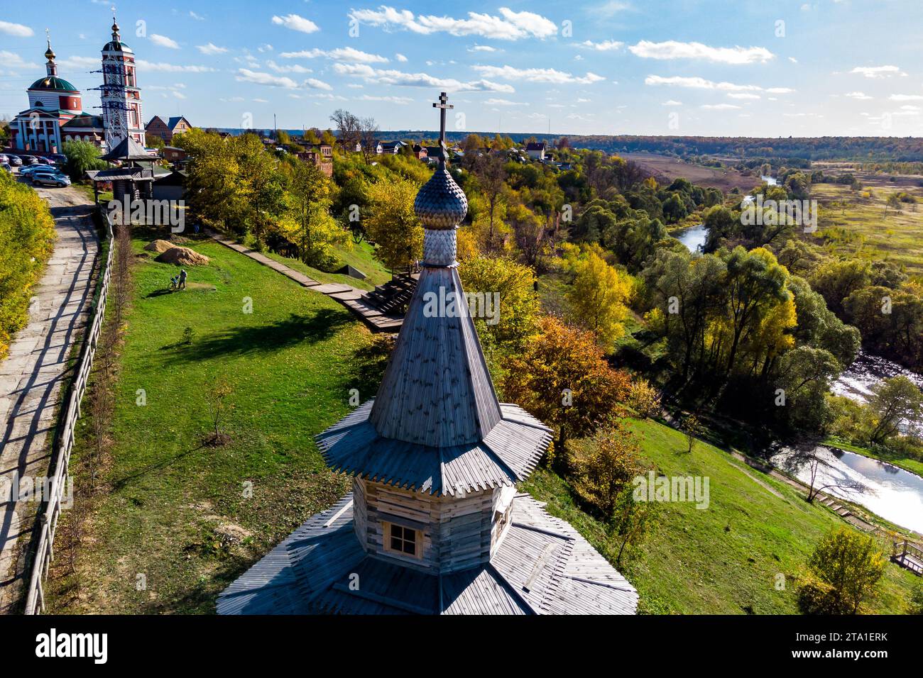 Scenic pastoral aerial view of countryside with wooden chapel in ...