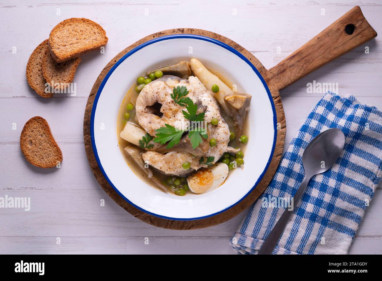 Conger eel with white asparagus and egg. Traditional Spanish tapas ...