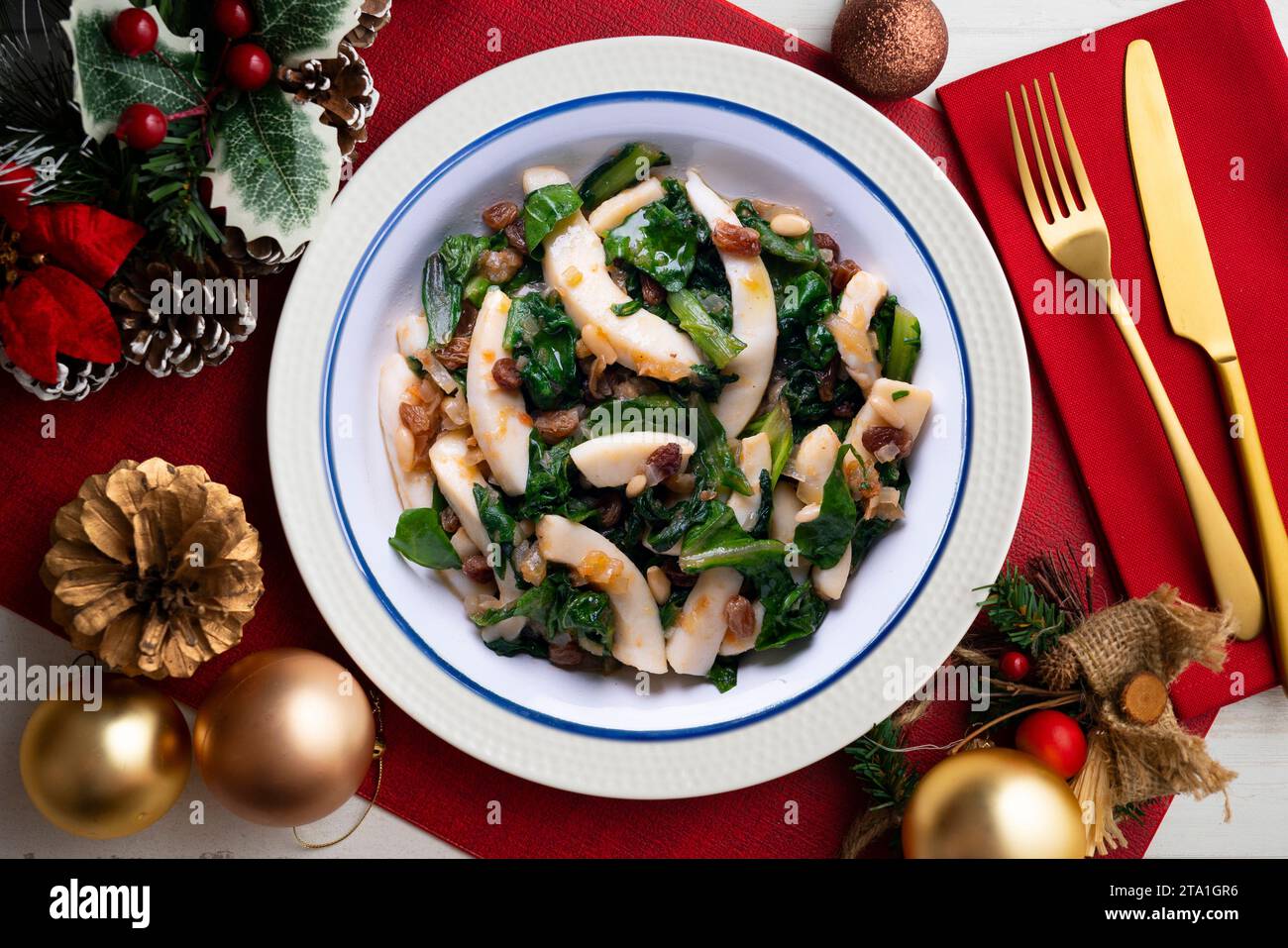 Cuttlefish cooked with chard and spinach. Spanish traditional tapas ...