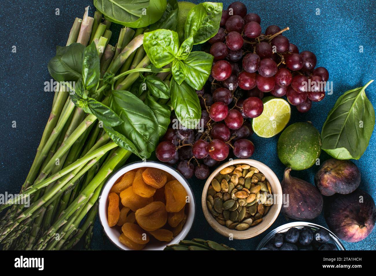 Variety of fresh raw organic fruits and vegetables. Health foods high ...