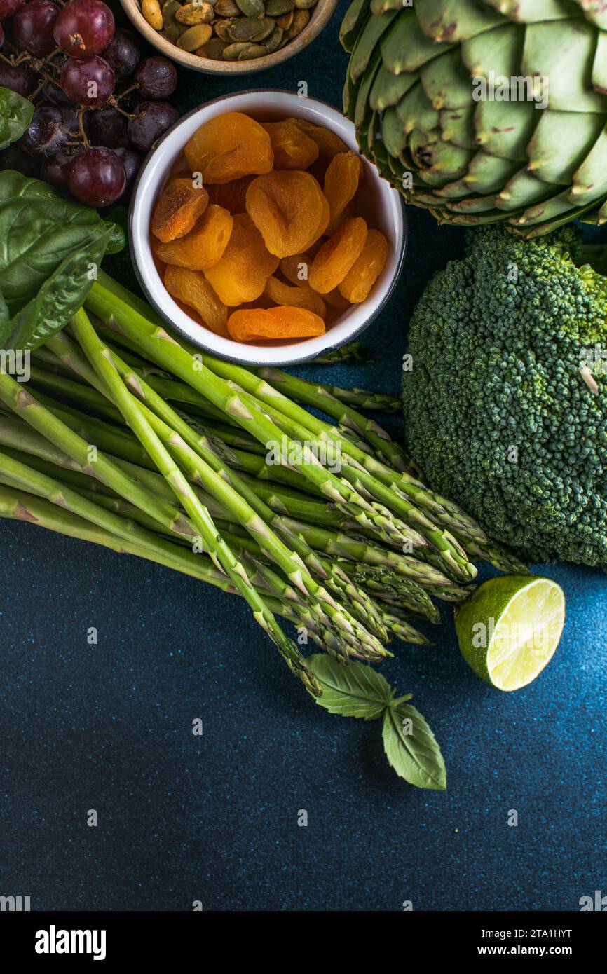 Variety of fresh raw organic fruits and vegetables. Health foods high ...