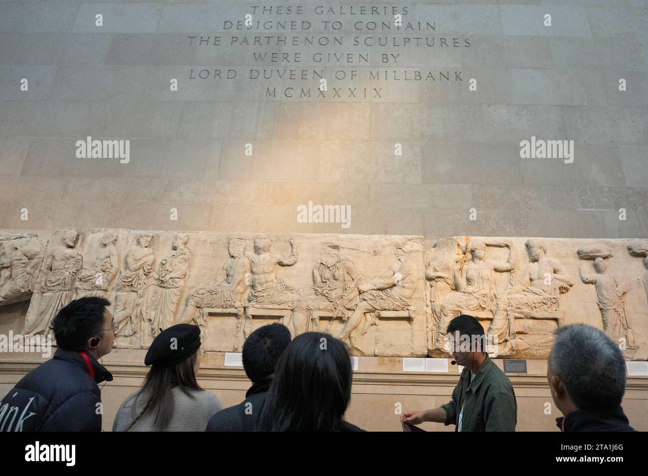 Visitors look at sculptures in the Parthenon Gallery at the British Museum in London, Tuesday ...