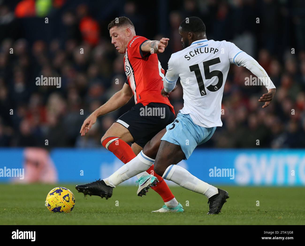 Ross Barkley of Luton Town is tackled by Jeffrey Schlupp of Crystal ...