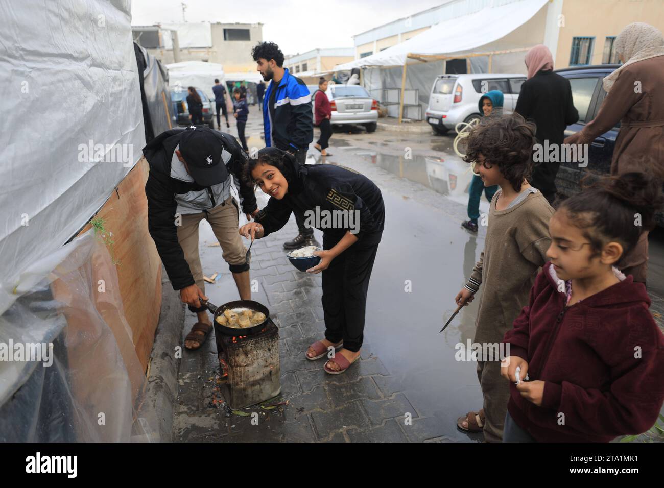 Displaced Palestinians, living in tents, struggle with cold weather ...