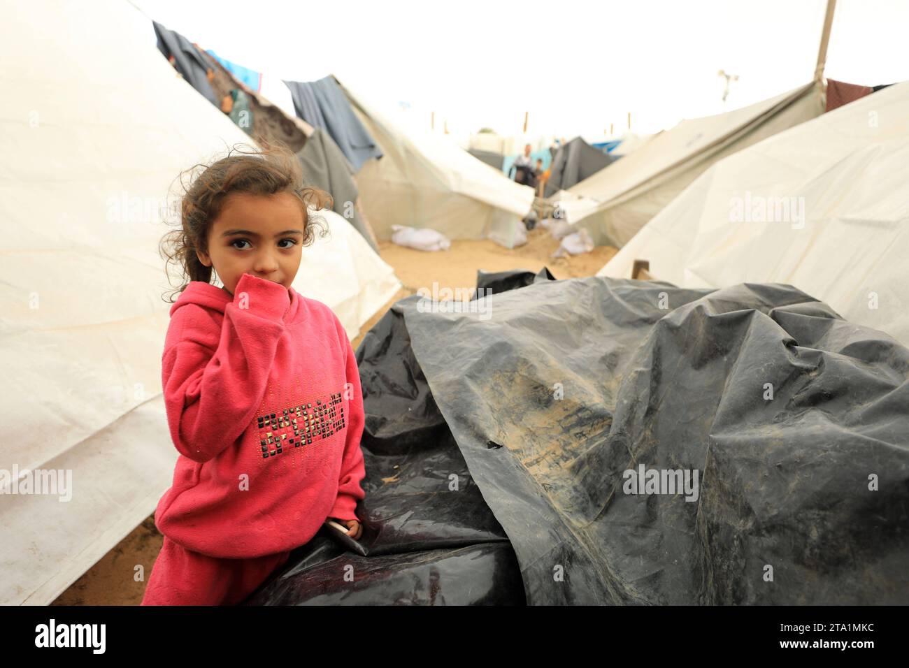 Displaced Palestinians, living in tents, struggle with cold weather ...