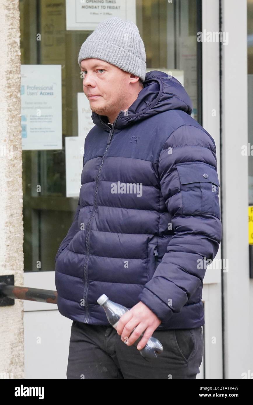 Michael Jones leaves Oxford Magistrates' Court, as four men have been ...