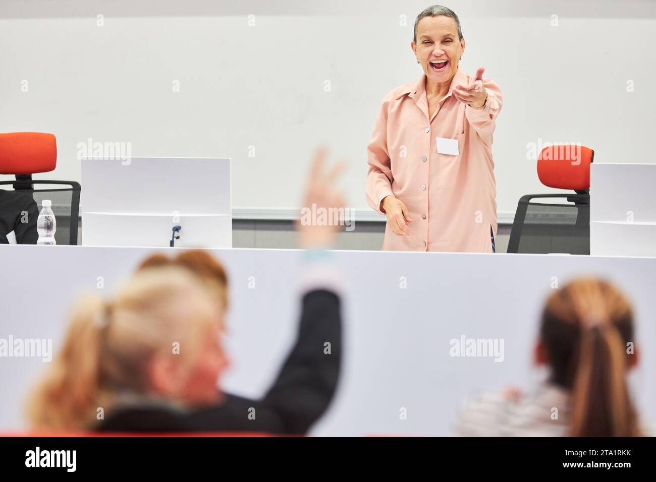 People raising hand hi-res stock photography and images - Alamy