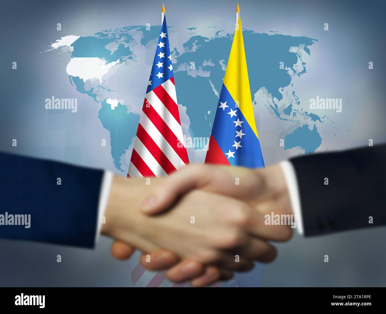 Two person shaking hands in front American,Venezuelan flags.Venezuela ...