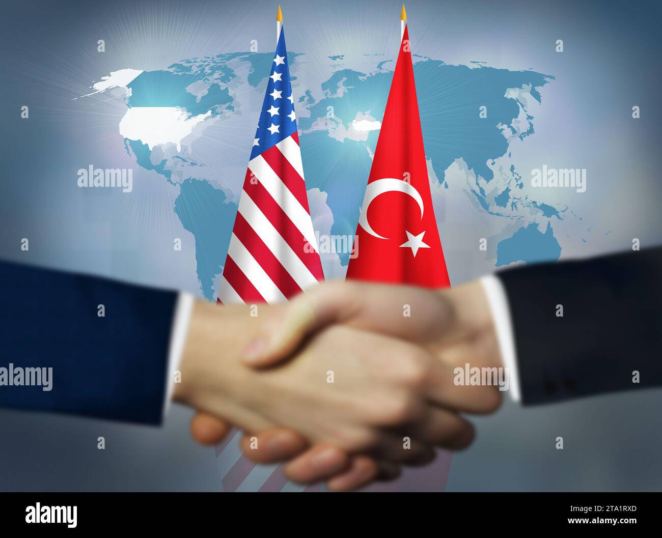 Two person shaking hands in front American,Turkish flags.Turkey,USA ...