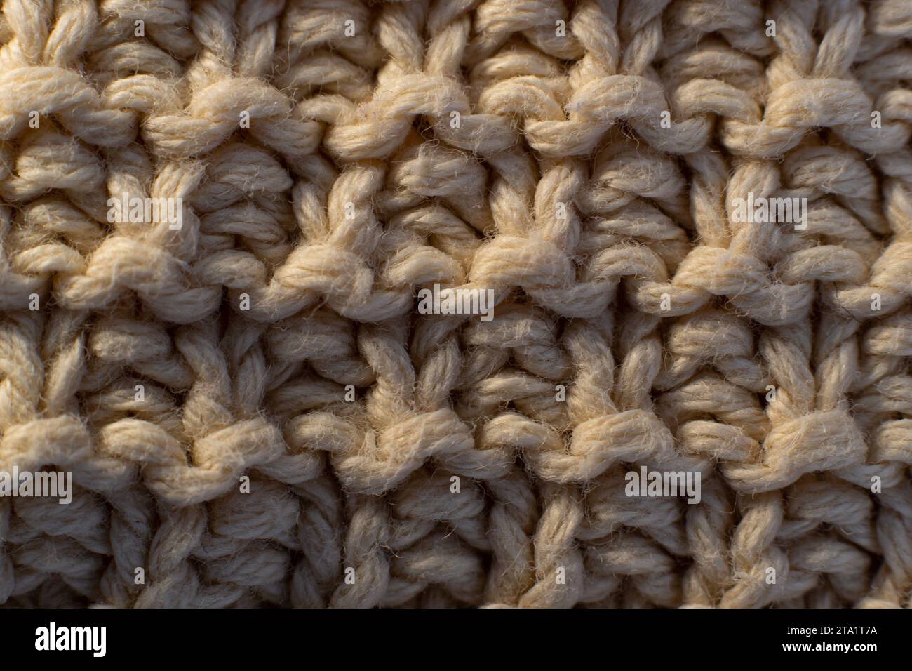 Macro view of the fabric of a garment. Texture of fabric with warm ...