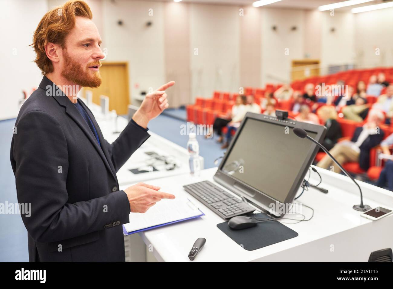 Business people pointing at monitor hi-res stock photography and images ...