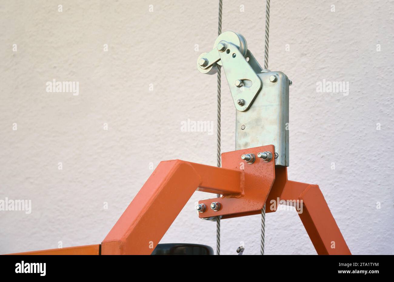 Safety lock as part of suspended wire rope platform for facade works on ...