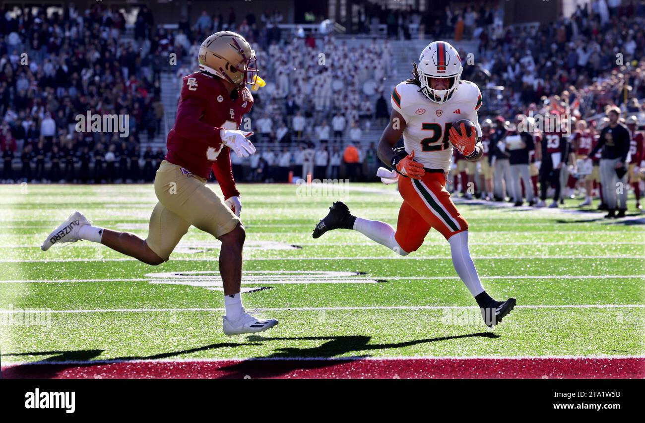 Miami running back Henry Parrish Jr., right, runs into the endzone to ...
